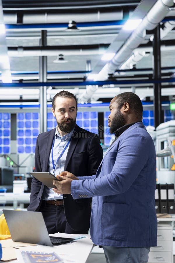 Group of Industry Experts and Engineers Analyzing Solar Panel Systems Stock Image - Image of ...