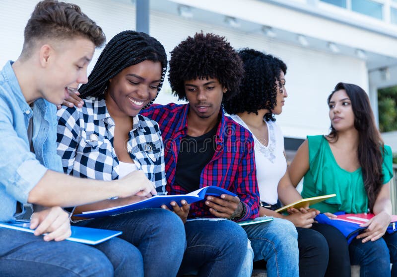 Group of International Students Learning Outdoors on Campus Stock Photo ...