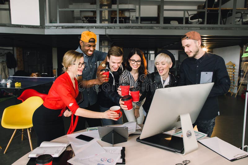 Group of International Students or Workers in Loft Office Clinking Cups ...