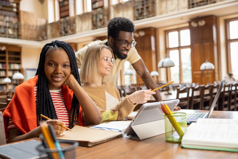 Group of International Students Working Together in the Library Stock ...