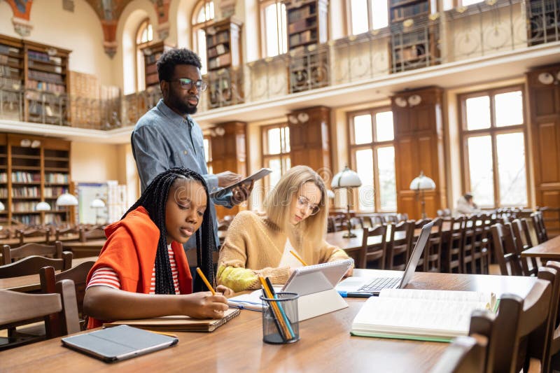 Group of International Students Working Together in the Library Stock Image - Image of ...