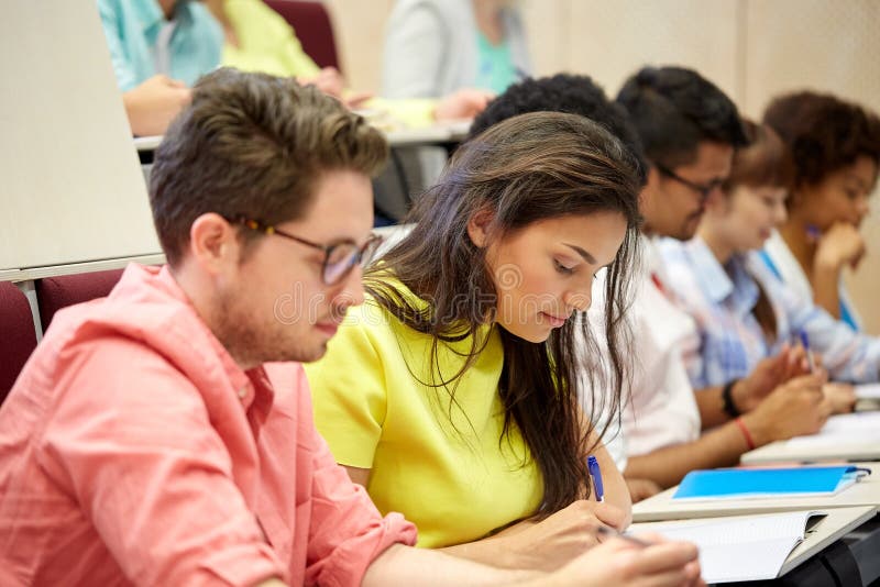 Group of International Students Writing at Lecture Stock Photo - Image ...