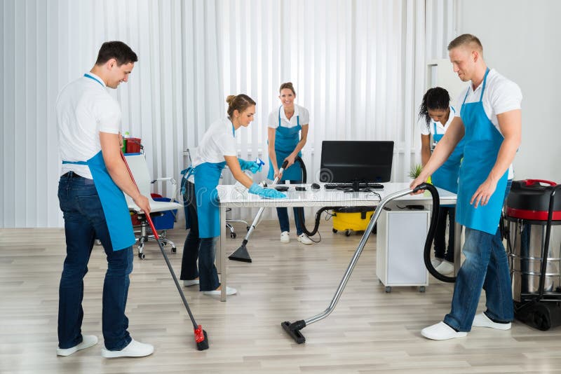 Group of Janitors Cleaning the Office Stock Image - Image of ...