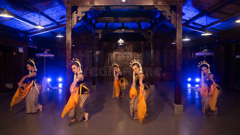 A Group of Javanese Dancers are Dancing a Traditional Dance in an Old ...