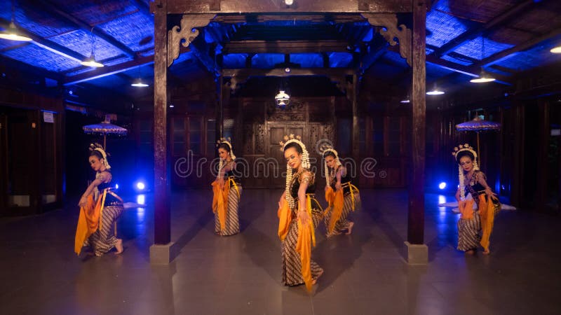 A Group of Javanese Dancers are Dancing a Traditional Dance in an Old ...