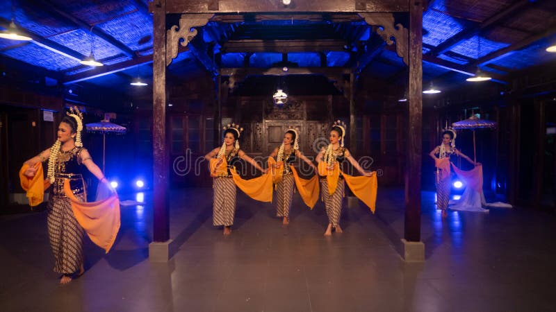 A Group of Javanese Dancers are Dancing a Traditional Dance in an Old ...