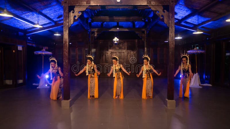 A Group of Javanese Dancers in Traditional Patterned Costumes Dance ...