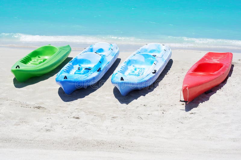 Group of kayaks in a beach stock photo. Image of nature - 11049292