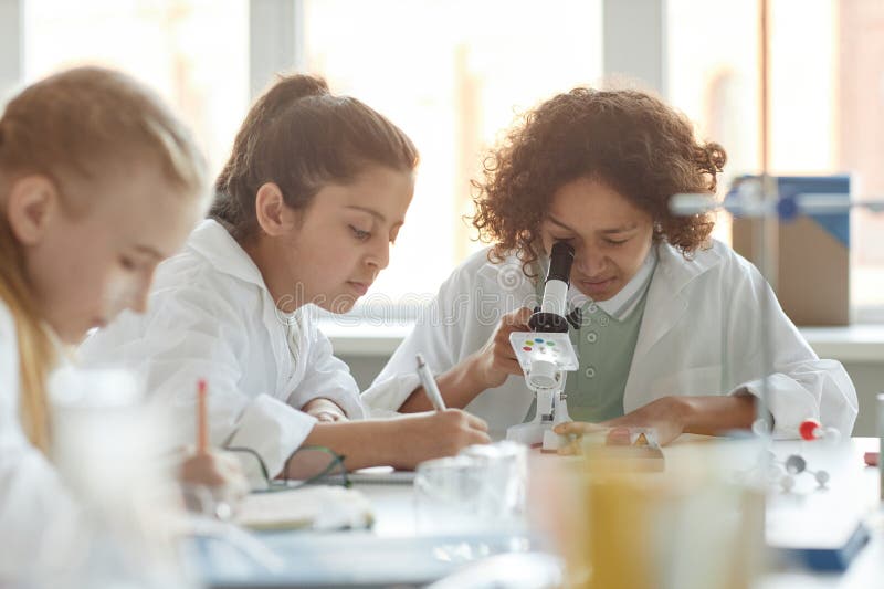 Group of Students Experimenting during Chemistry Class Stock Image ...