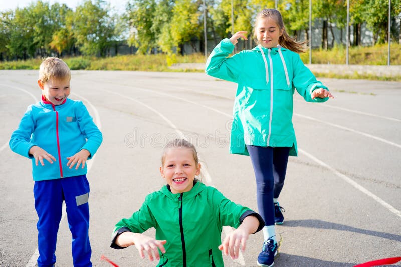 Kids on a stadium stock image. Image of runner, legs - 103248257