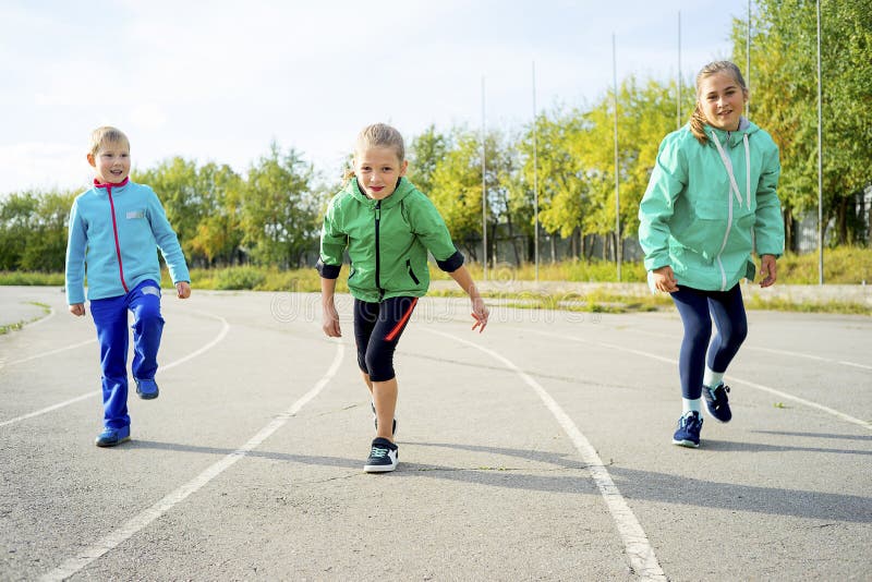 Kids on a stadium stock photo. Image of children, male - 103248392