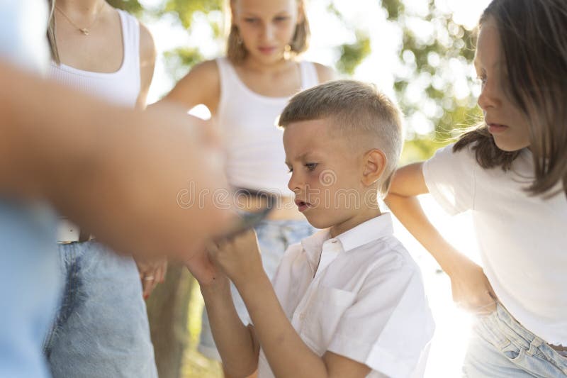 Children Engaging with Technology Outdoors in Summer Stock Image ...