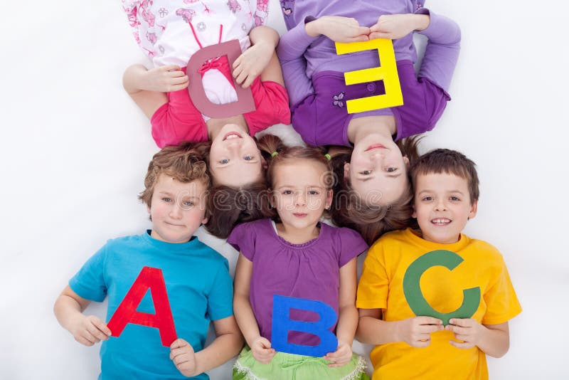 Group of Kids Holding Alphabetical Letters Stock Photo - Image of ...