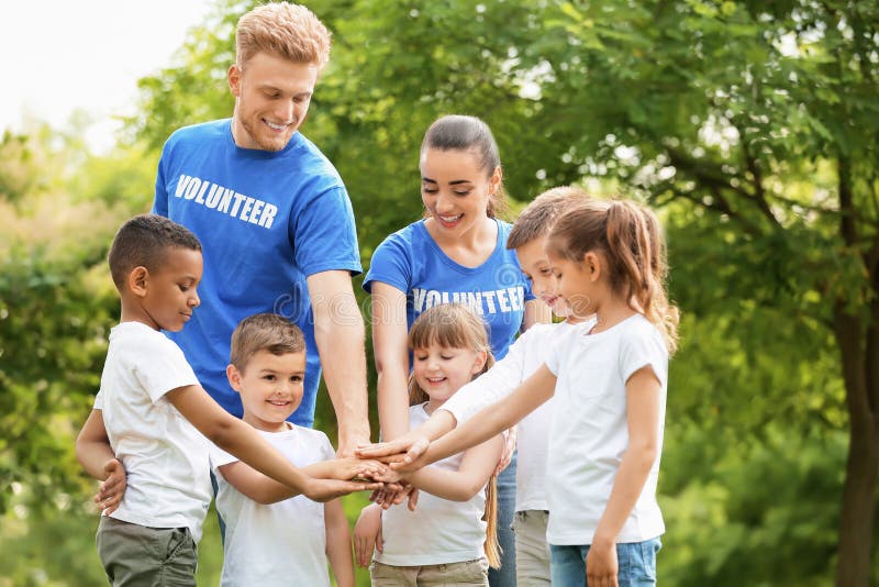 Kids Joining Fingers Forming a Star. Stock Photo - Image of green ...