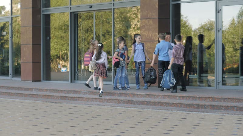Group of Kids Meet Each Other in Front of School Stock Video - Video of ...