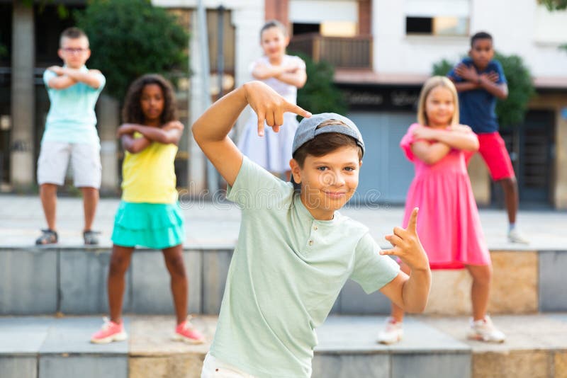 Group of Kids Performing Street Dance Outdoors Stock Photo - Image of ...