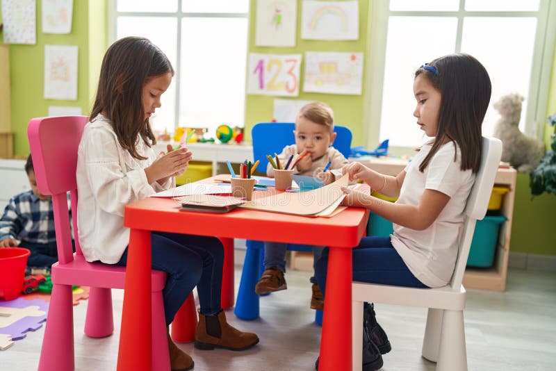 Group of Kids Preschool Students Sitting on Table Drawing and Make ...