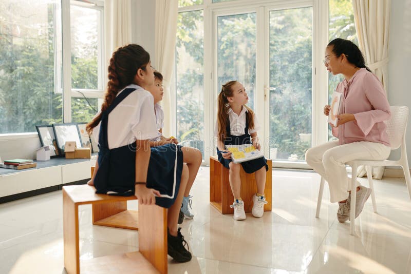 Group of Kids Reading Letter on Card Stock Image - Image of grade ...