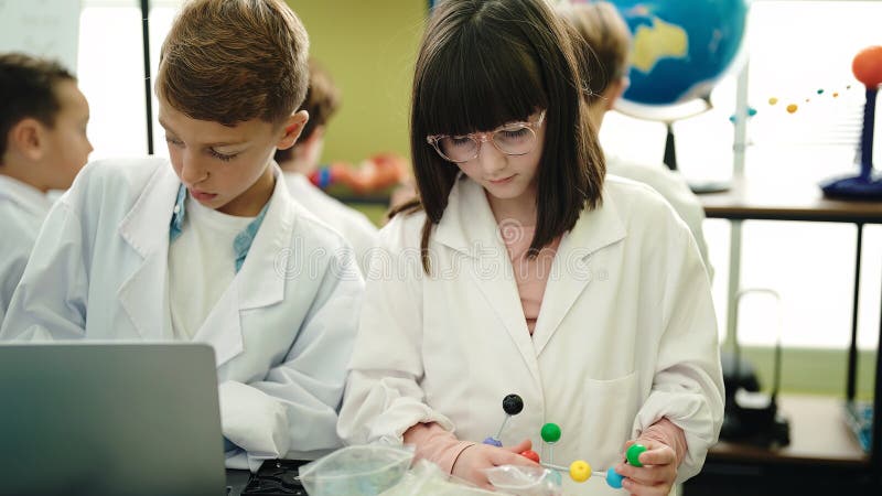 Group of Kids Scientists Students Using Laptop Holding Molecules at ...