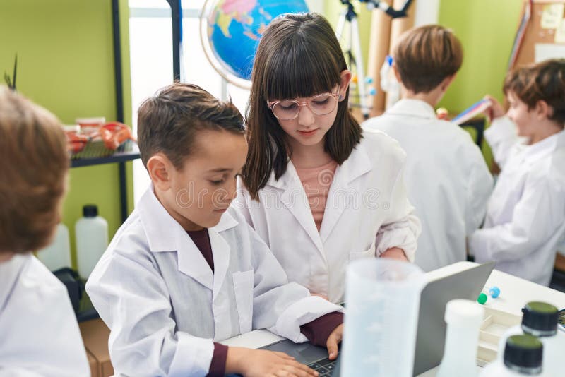 Group of Kids Scientists Students Using Laptop at Laboratory Classroom Stock Image - Image of ...