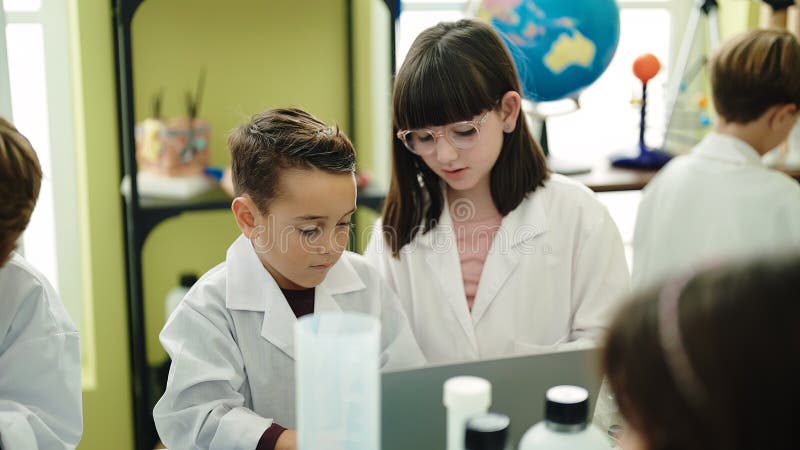 Group of Kids Scientists Students Using Laptop at Laboratory Classroom ...