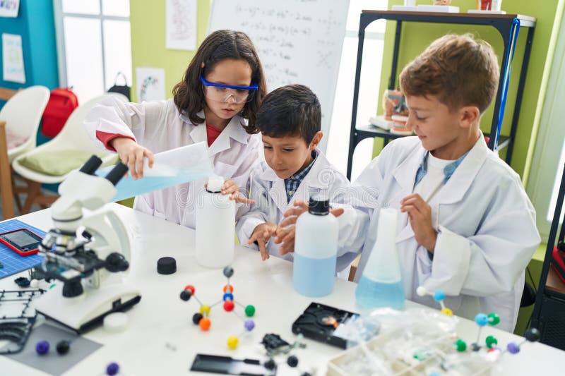 Group of Kids Students Pouring Liquid on Bottl Doing Experiment at ...