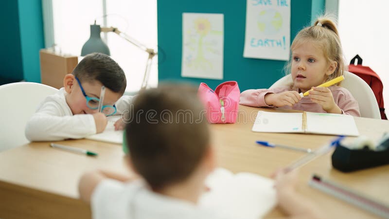 Group of Kids Students Sitting on Table Drawing on Notebook at ...
