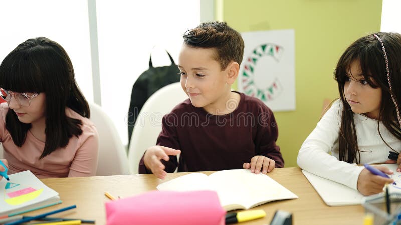 Group of Kids Students Sitting on Table Studying at Classroom Stock ...