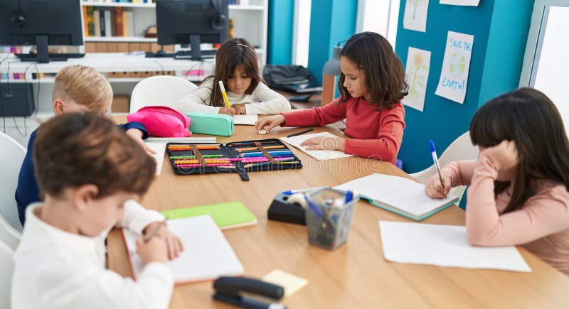 Group of Kids Students Sitting on Table Studying at Classroom Stock ...
