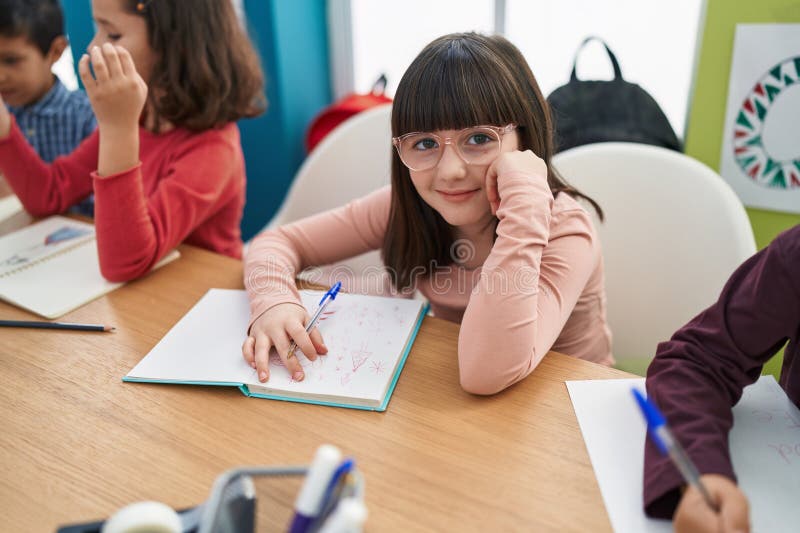Group of Kids Students Sitting on Table Studying at Classroom Stock ...