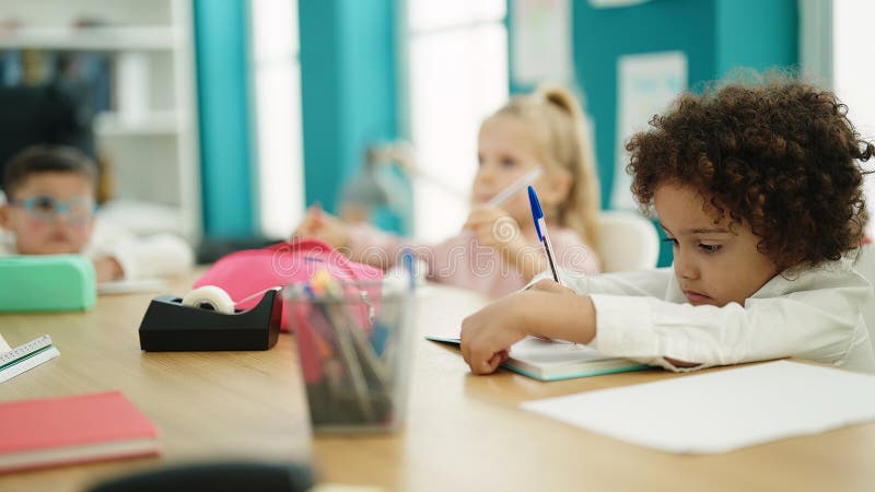 Group of Kids Students Sitting on Table Studying at Classroom Stock ... Group of Kids Students Sitting on Table Studying at Classroom Stock ...