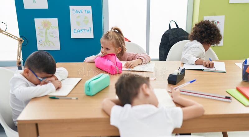 Group of Kids Students Sitting on Table Studying at Classroom Stock ... Group of Kids Students Sitting on Table Studying at Classroom Stock ...
