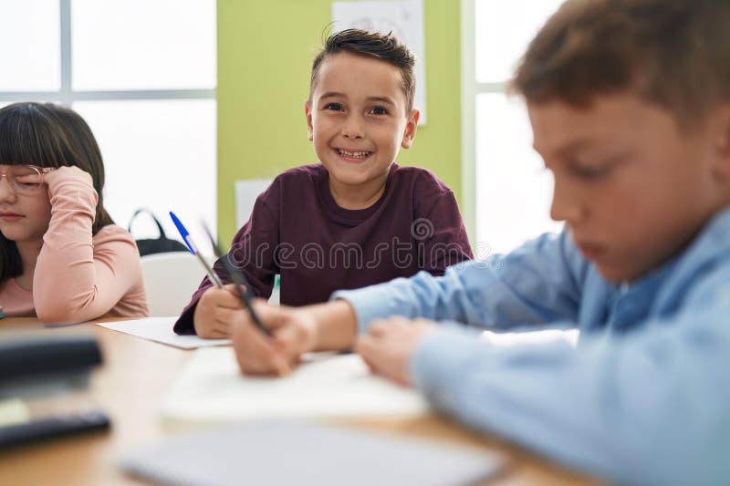 Group of Kids Students Sitting on Table Studying at Classroom Stock ...