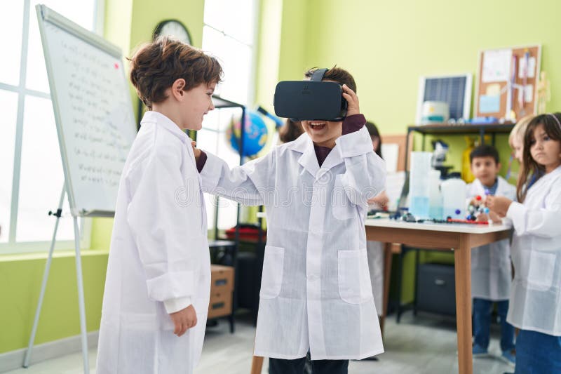 Group of Kids Students Using Virtual Reality Glasses at Laboratory ...