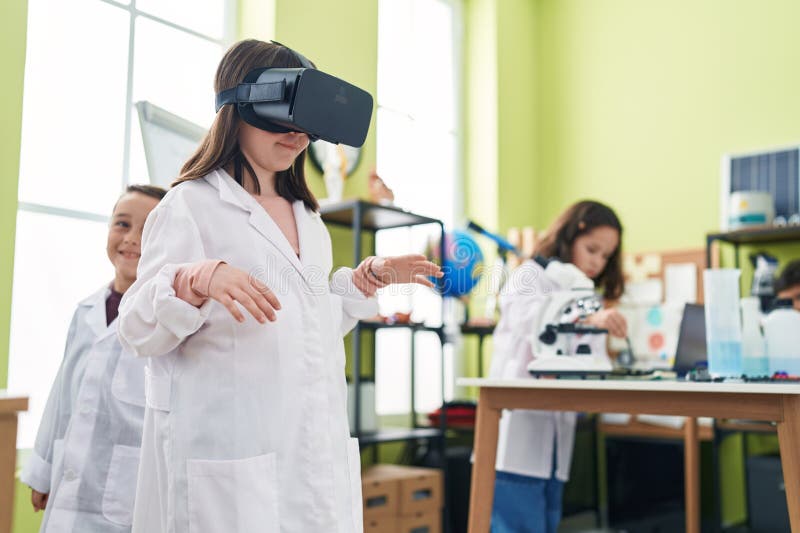 Group of Kids Students Using Virtual Reality Glasses at Laboratory ...