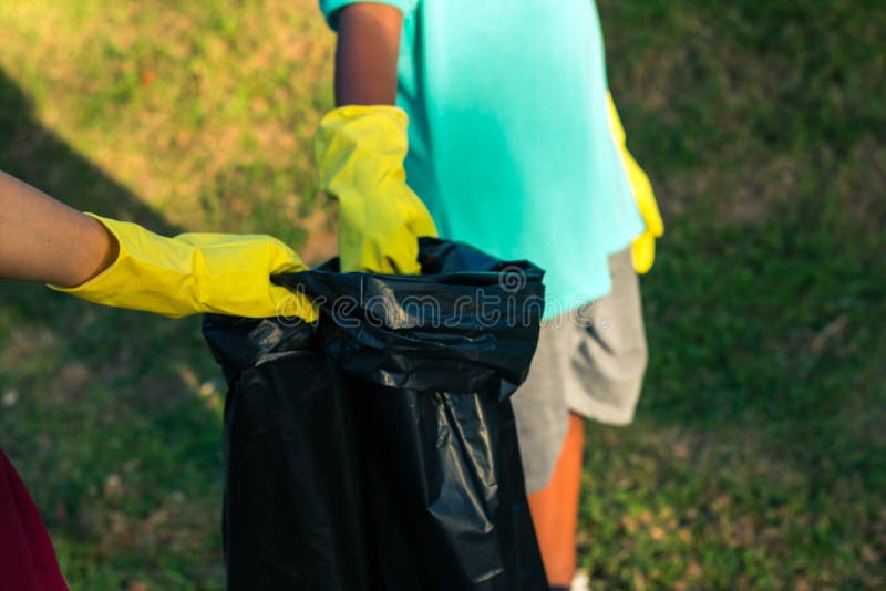 Group of Kids Volunteer Help Garbage Collection. Stock Image - Image of ...