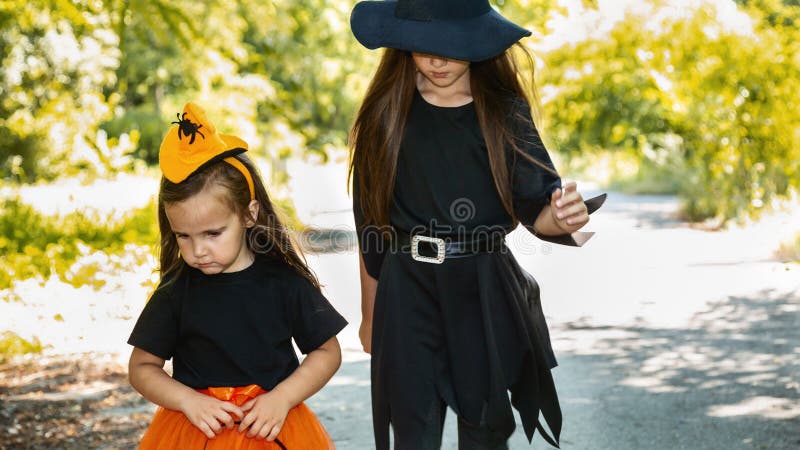 Group of Kids Wearing Halloween Costume Walking Together at Street ... Group of Kids Wearing Halloween Costume Walking Together at Street ...
