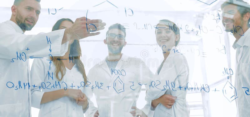 Group of Laboratory Scientists Discussing Their Research in the Stock ...