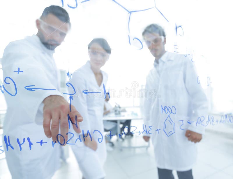 Group of Laboratory Scientists Discussing Their Research in the ...