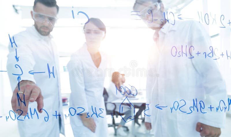 Group of Laboratory Scientists Discussing Their Research in the ...