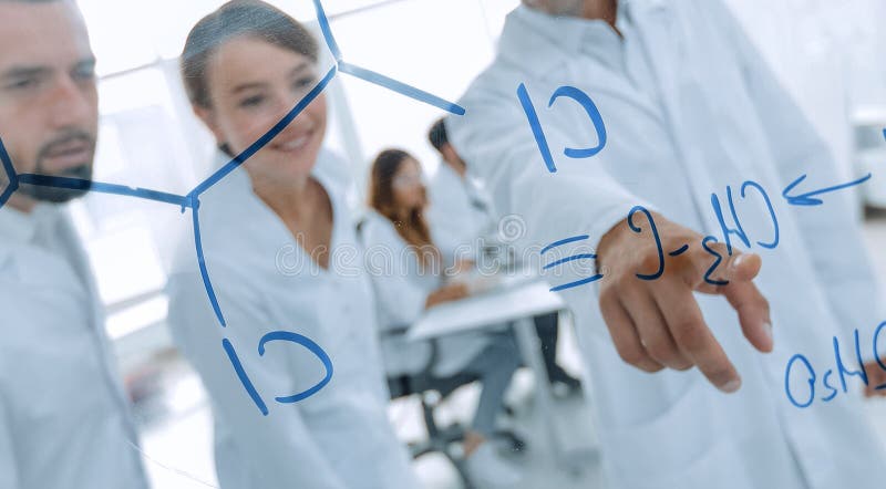 Group of Laboratory Scientists Discussing Their Research in the Stock ...