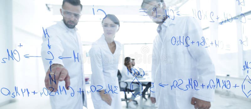 Group of Laboratory Scientists Discussing Their Research in the ...