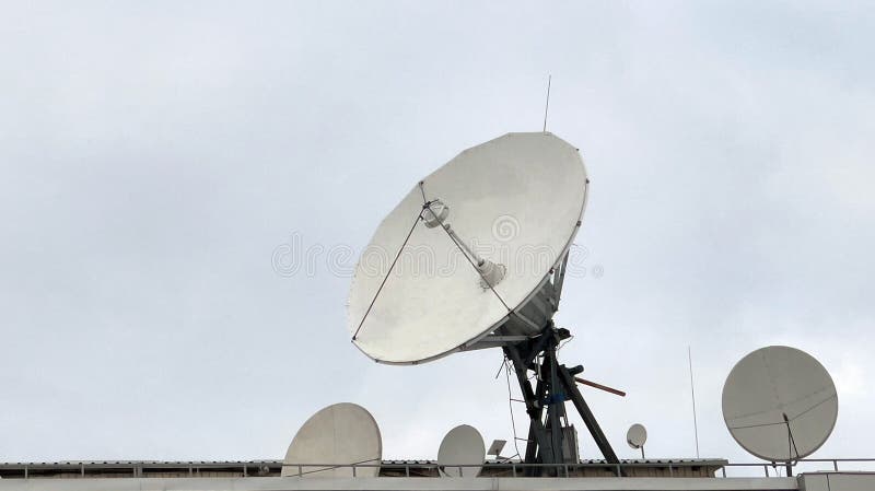 A Group of Large Terrestrial Satellites are Pointed Upward, a Large ...