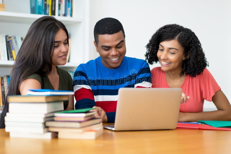 Group of Latin American and Mexican Students Learning at Computer Stock ...
