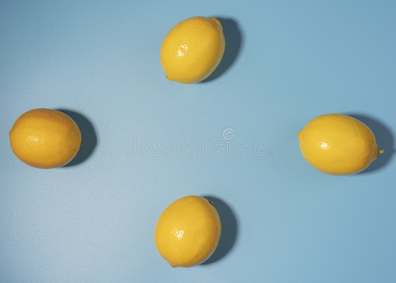 A Group of Lemons on Blue Background Stock Image - Image of isolated ...