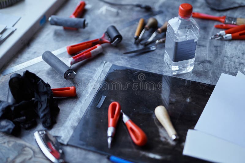Group of Linocut Tools on Dark Table. Lithography Concept Stock Image ...