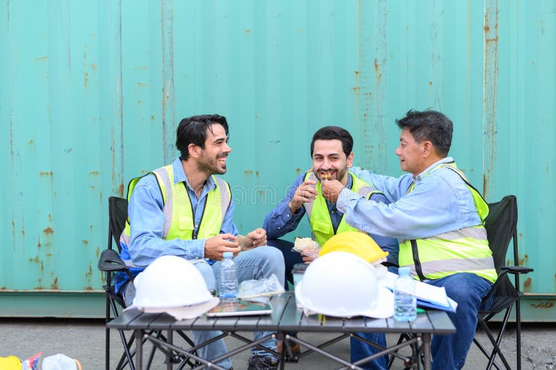 Container Operators Wearing Helmets and Safety, Vests Control Via ...