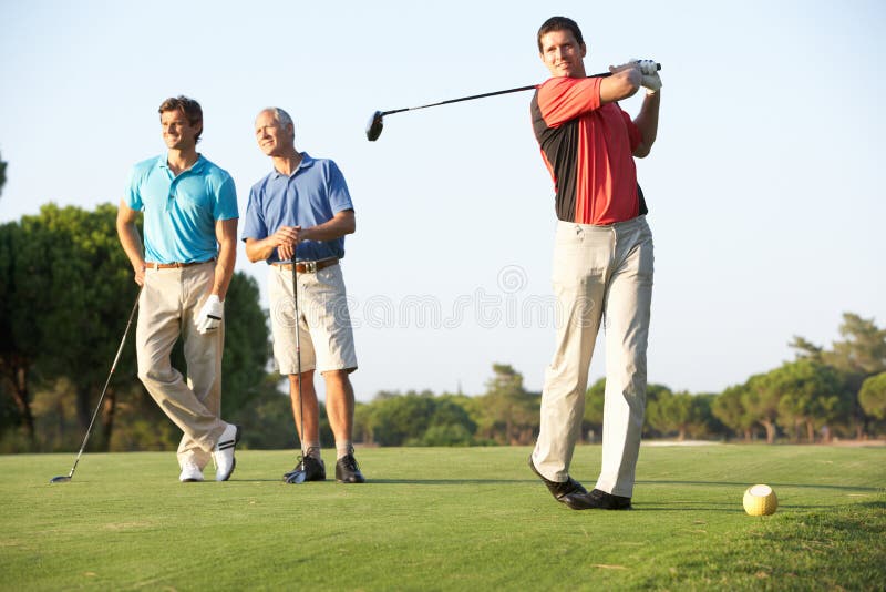 Group of Male Golfers Teeing Off Stock Image - Image of sport, retired ...