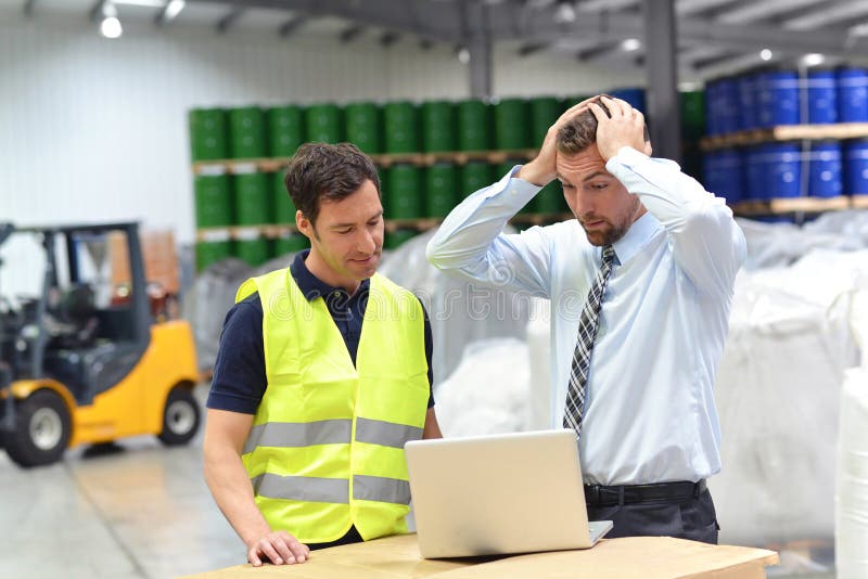 Group of Manager and Worker in the Logistics Industry Work in a ...