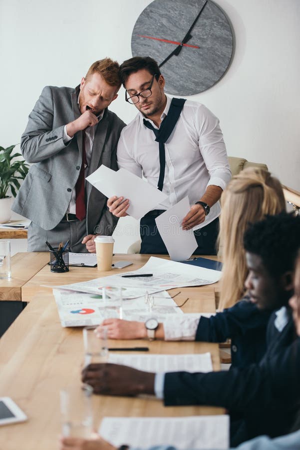 Group of Managers Having Conversation in Conference Hall Stock Photo ...